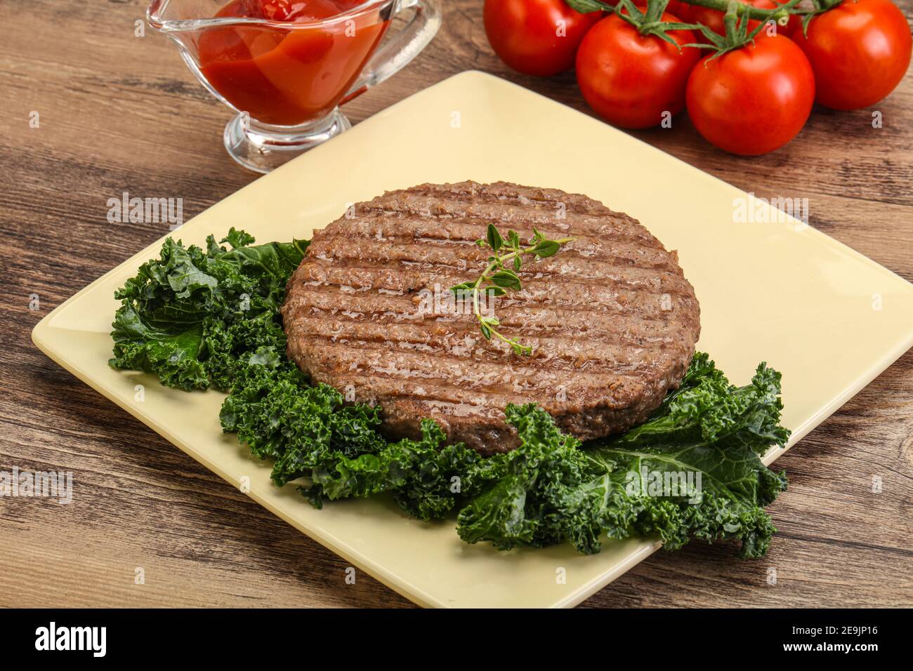 Grilled tasty beef cutlet for burger Stock Photo - Alamy