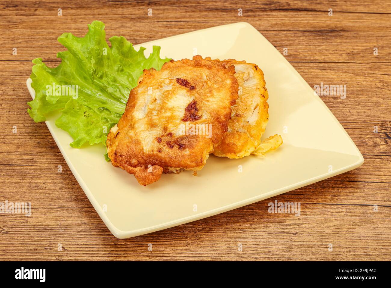 Roasted cod fish in the bread Stock Photo - Alamy