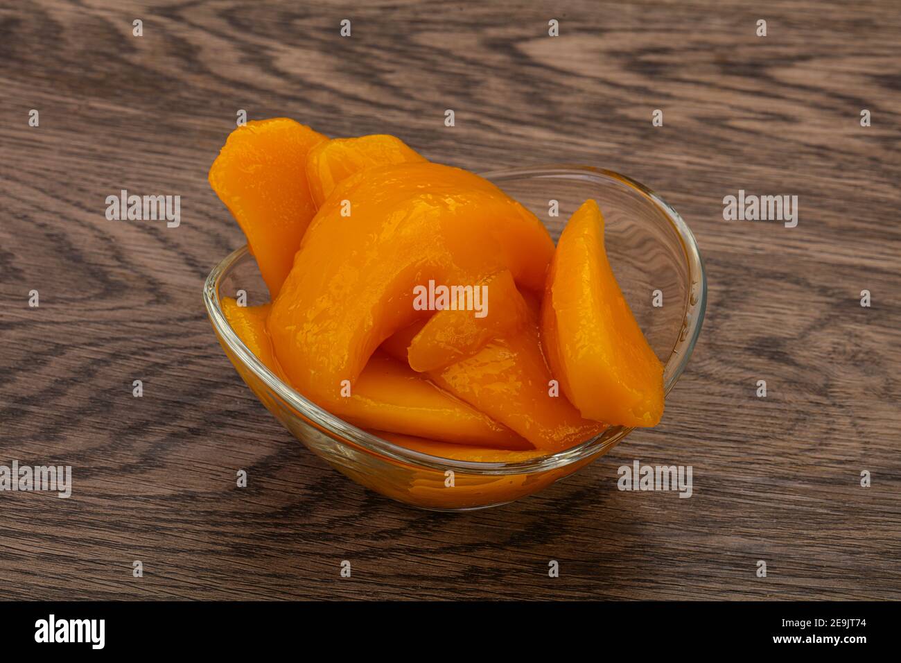 Sweet delicous mango slices in syrop Stock Photo - Alamy