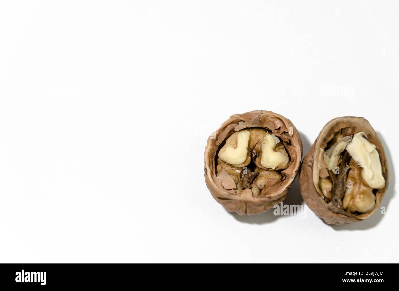 Open walnuts on white background, clipping path Stock Photo - Alamy