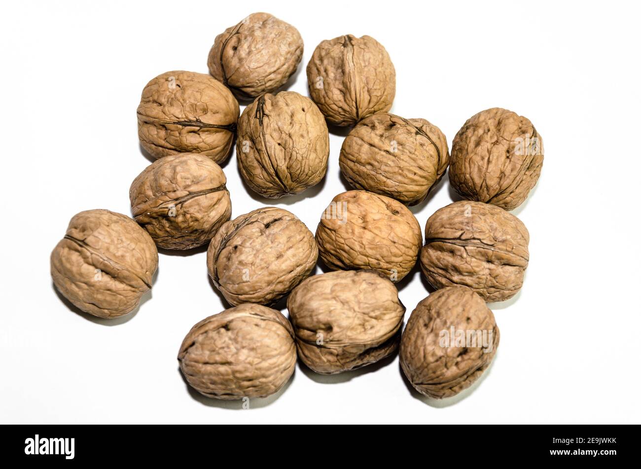 Group of fresh walnuts on white background Stock Photo - Alamy