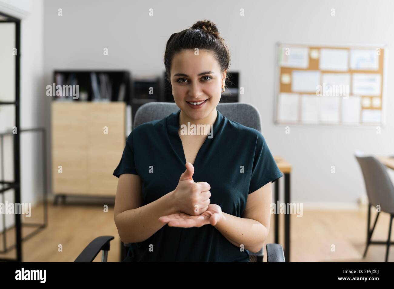 Adult Learning Sign Language For Deaf Disabled Stock Photo - Alamy