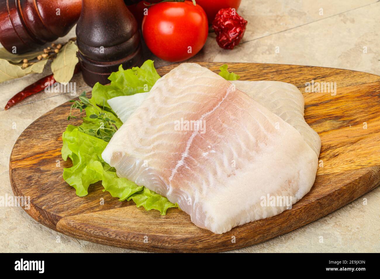 Raw pangasius fillet fish for cooking Stock Photo - Alamy