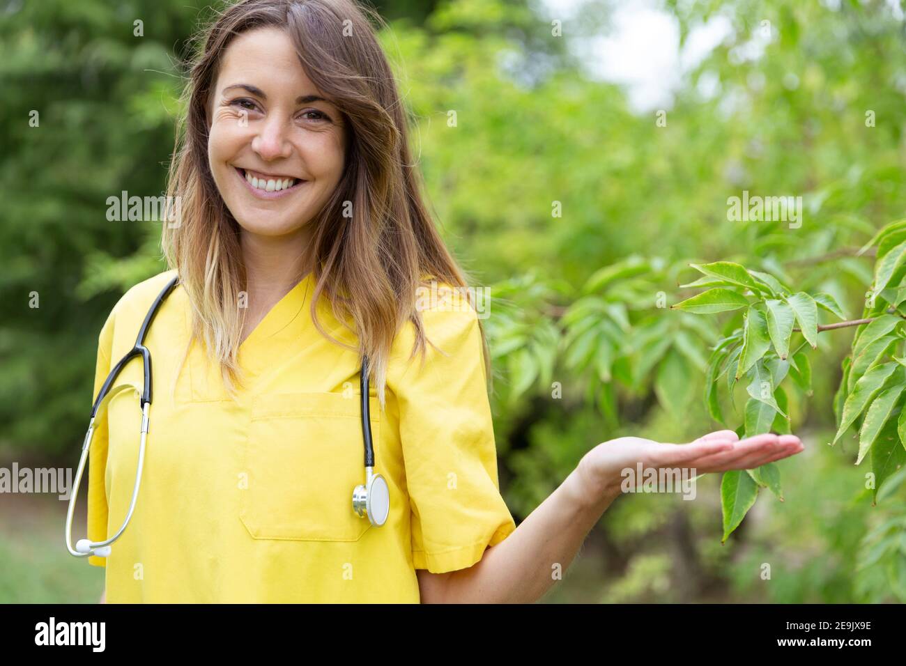 Portrait of Caucasian female nurse in her uniform with a stethoscope ...