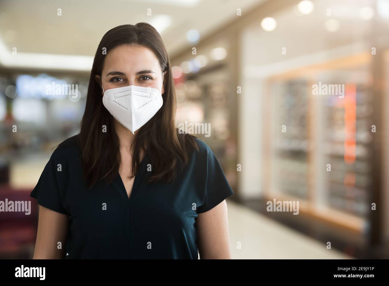 Customer Woman Shopping In Mall Wearing Face Mask Stock Photo - Alamy