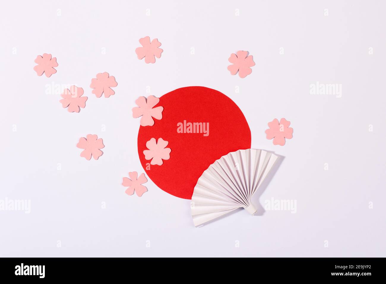 Red sun and origami paper fan isolated on white background. Paper ...