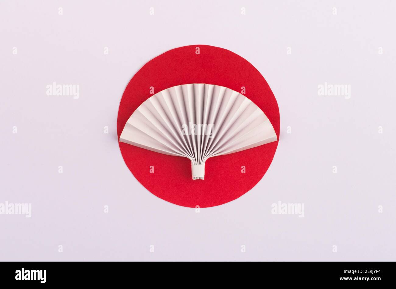 Red sun and origami paper fan isolated on white background. Paper ...