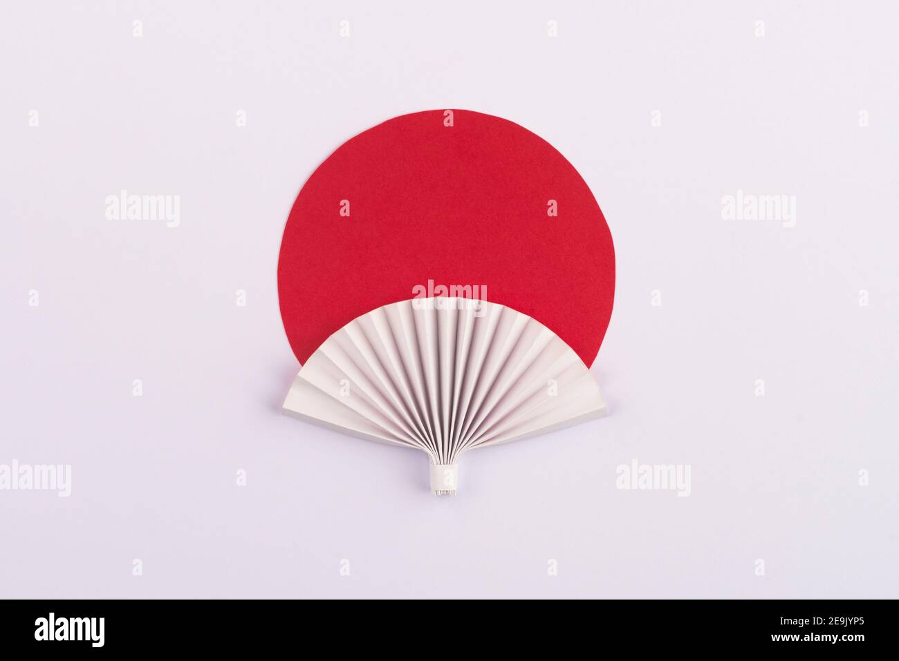 Red sun and origami paper fan isolated on white background. Paper ...