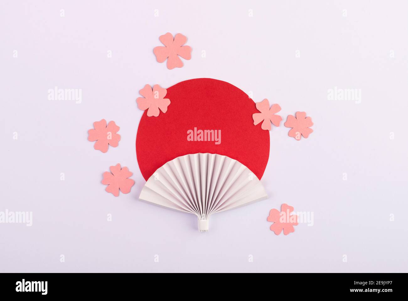 Red sun and origami paper fan isolated on white background. Paper ...