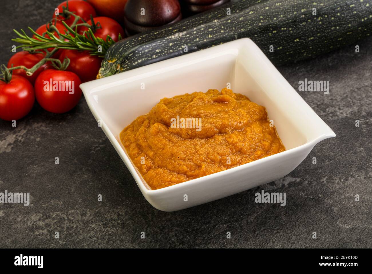 Vegetarian cuisine - Zucchini puree with herbs and spices Stock Photo ...
