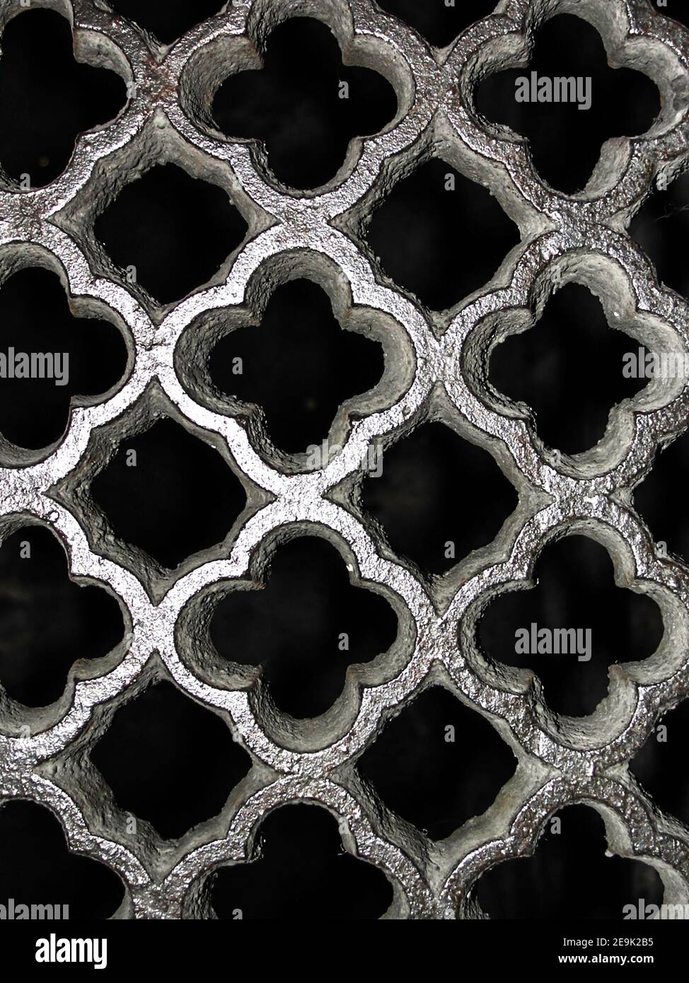 Grey steel protection grille texture with geometric figures seen from ...