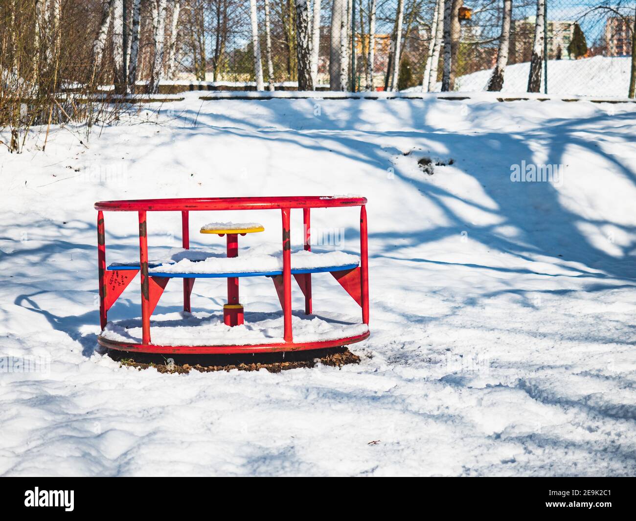 Abandoned carousel in snowy playground. Outdoor playground for kids ...