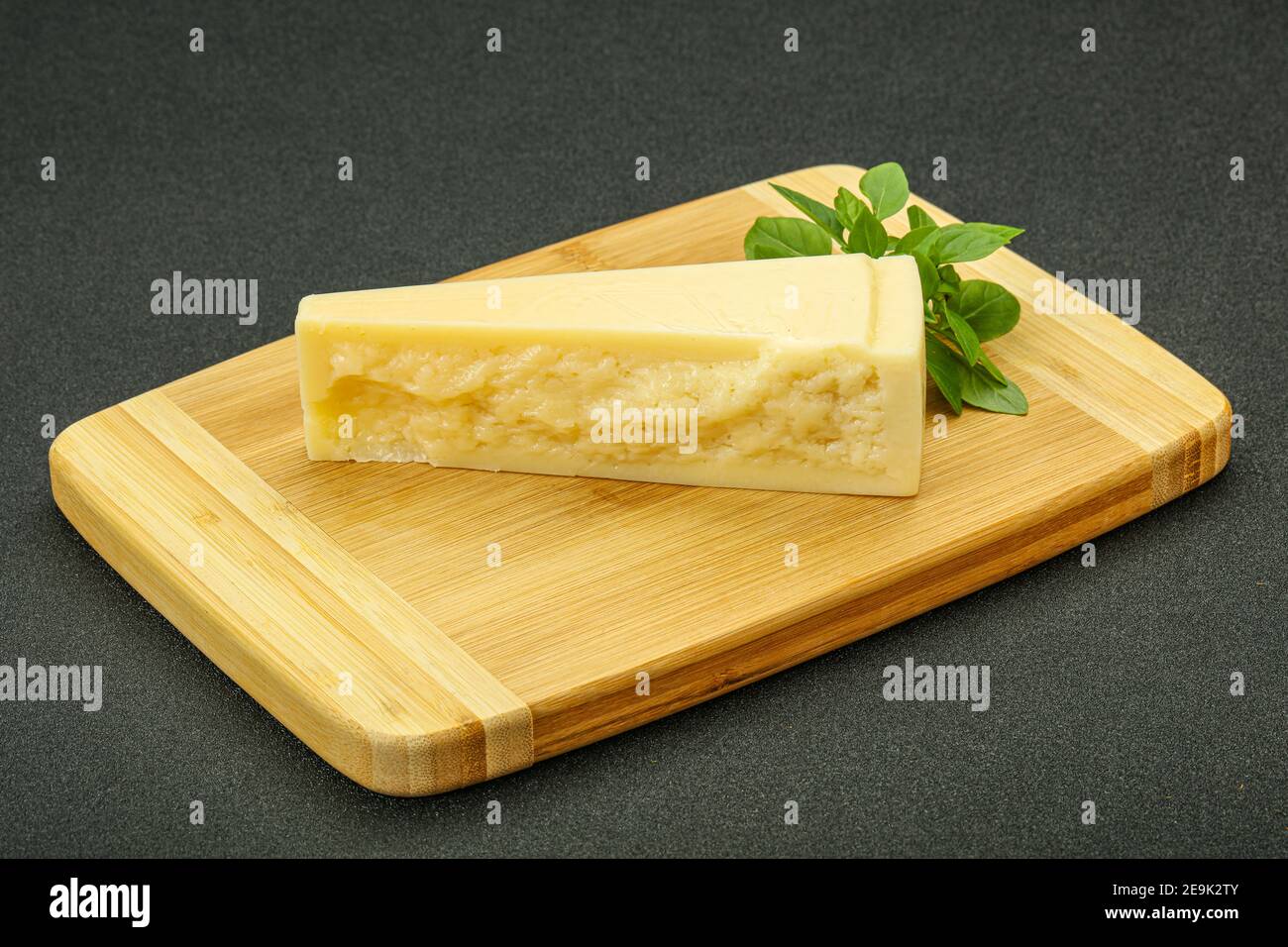 Hard parmesan cheese served basil leaves Stock Photo - Alamy