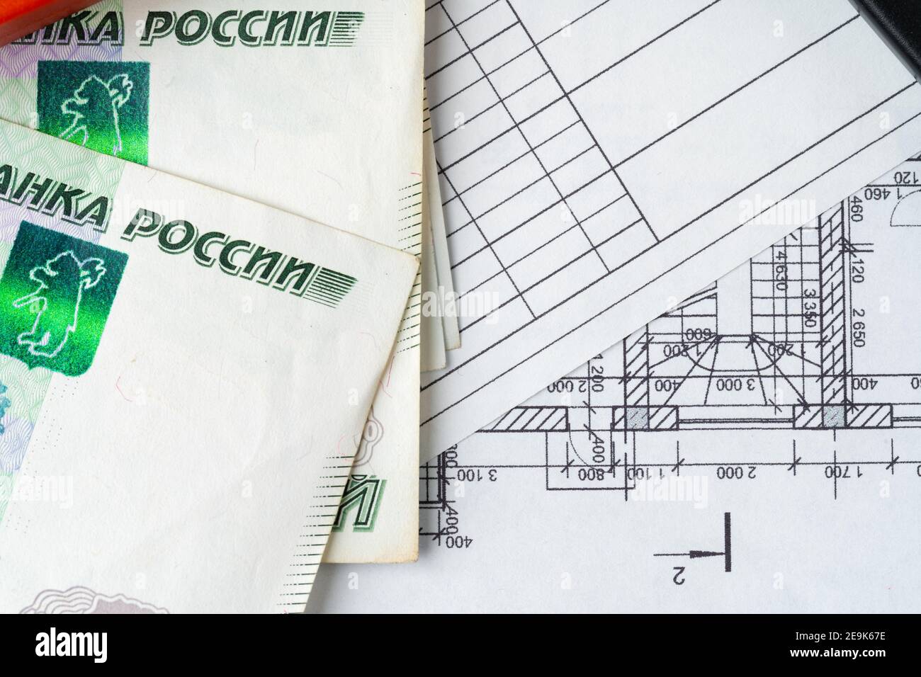 Architectural drawing and Russian Ruble money stack Stock Photo - Alamy