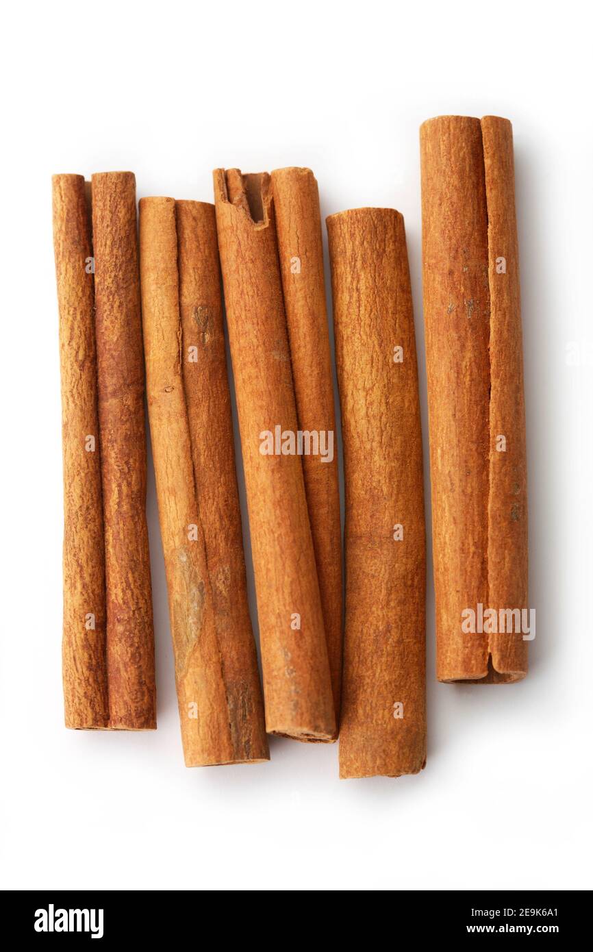 Close-up picture of cinnamon sticks on white background Stock Photo - Alamy