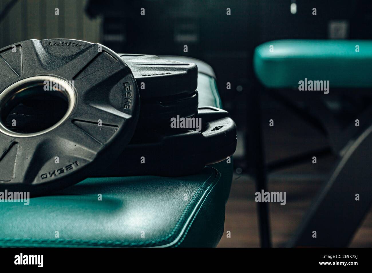 Weight plates in a gym, powerlifting equipment Stock Photo - Alamy