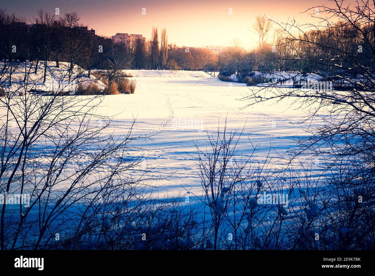 Frozen lake covered with snow in winter Stock Photo - Alamy