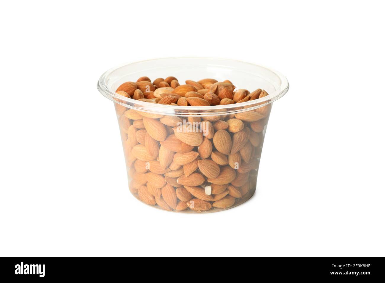 Plastic container with almond nuts isolated on white background Stock ...