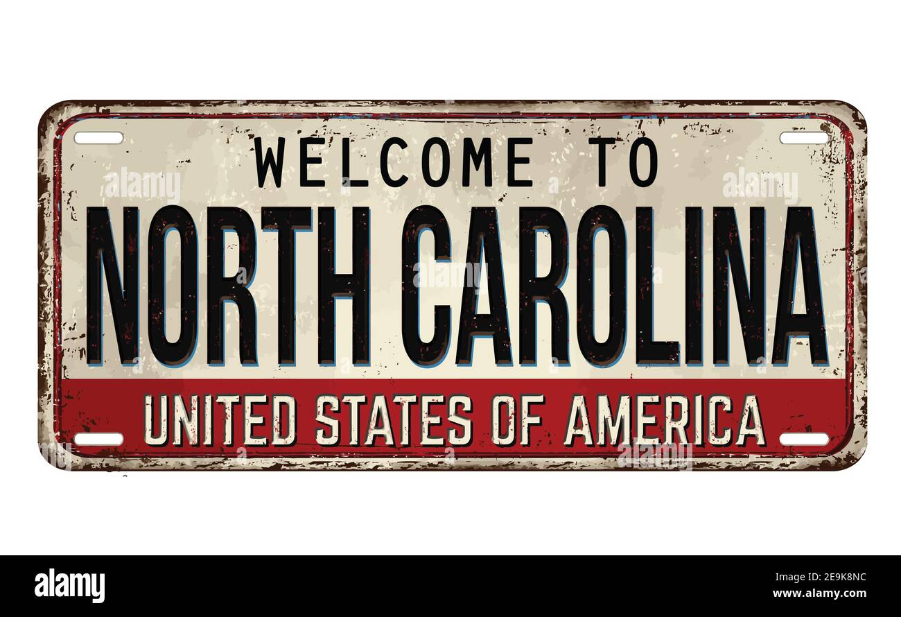 Welcome to North Carolina vintage rusty metal plate on a white ...