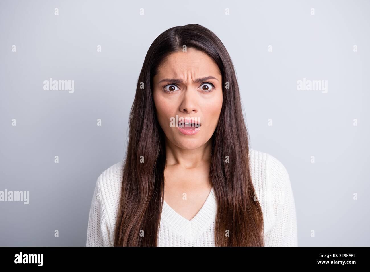 Portrait of attractive worried devastated brown-haired girl bad news ...
