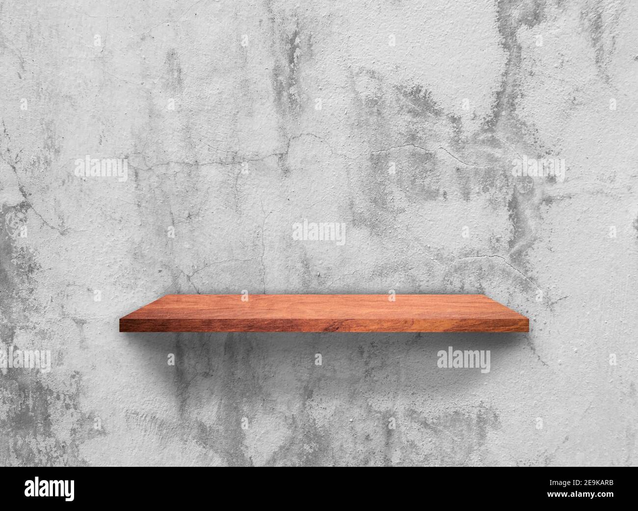 Rustic wooden shelf on grey concrete wall texture background with ...