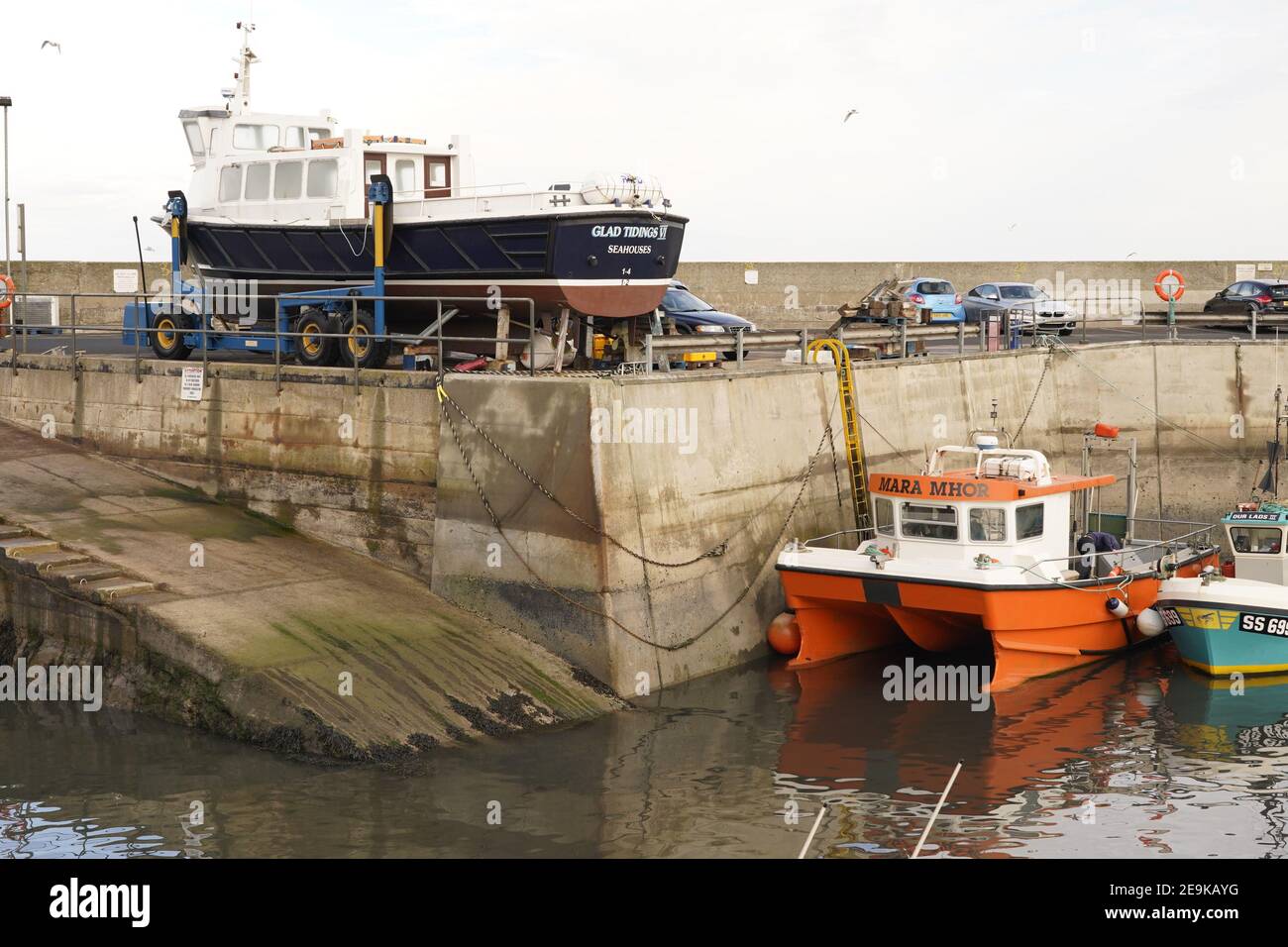 working fishing port of Seahouses in Northumberland, England Stock ...