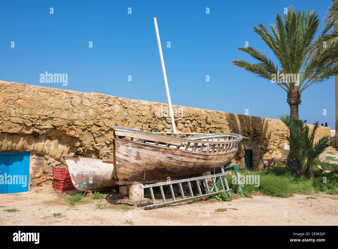 Old wooden boat on dry land Stock Photo - Alamy