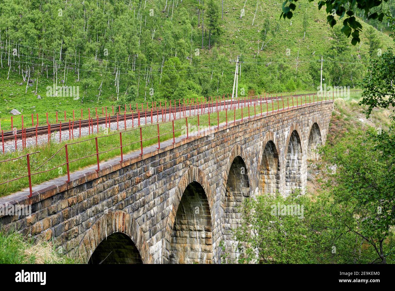Stone arched viaduct on Circum-Baikal Railway. Monument of railway ...