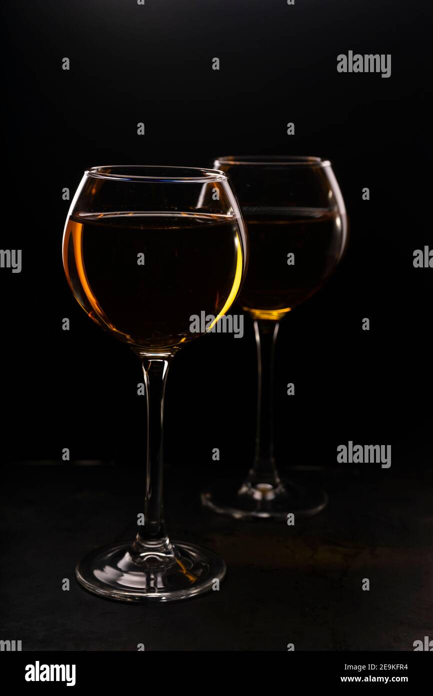 amber or orange wine made from white grapes. in a tall wine glass ...