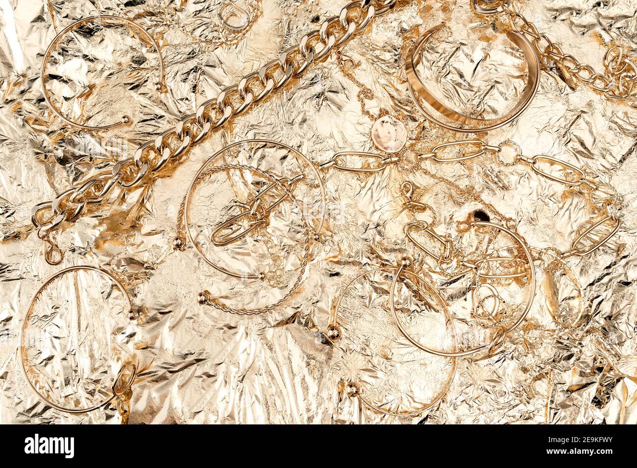 Golden jewellery background for wallpaper design. Gold festive backdrop ...
