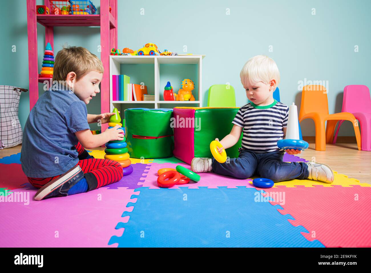 the little kids learn colors with toys Stock Photo - Alamy