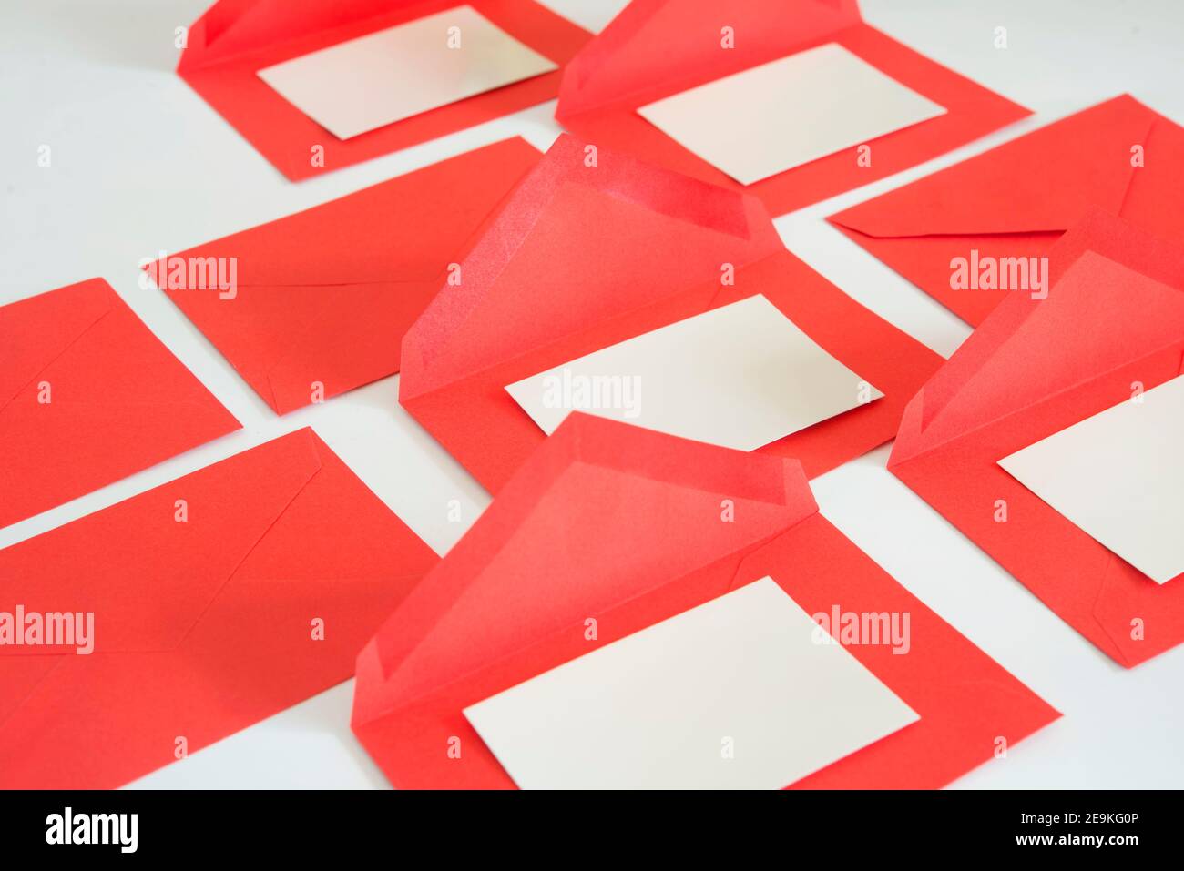 red letter envelope on white background Stock Photo - Alamy