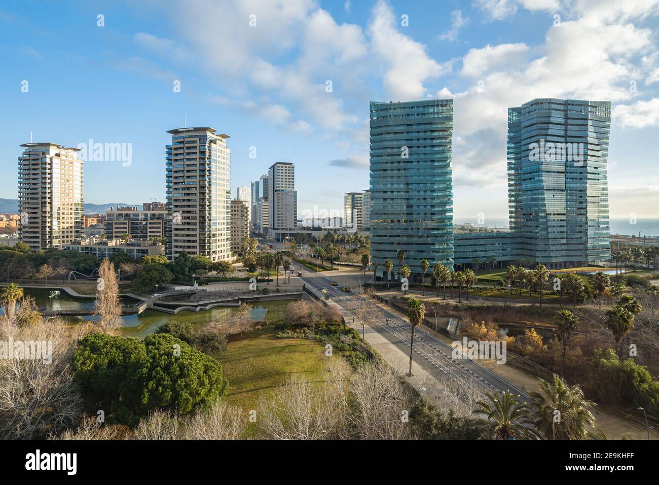 View of expensive area with park and modern high-rise buildings ...