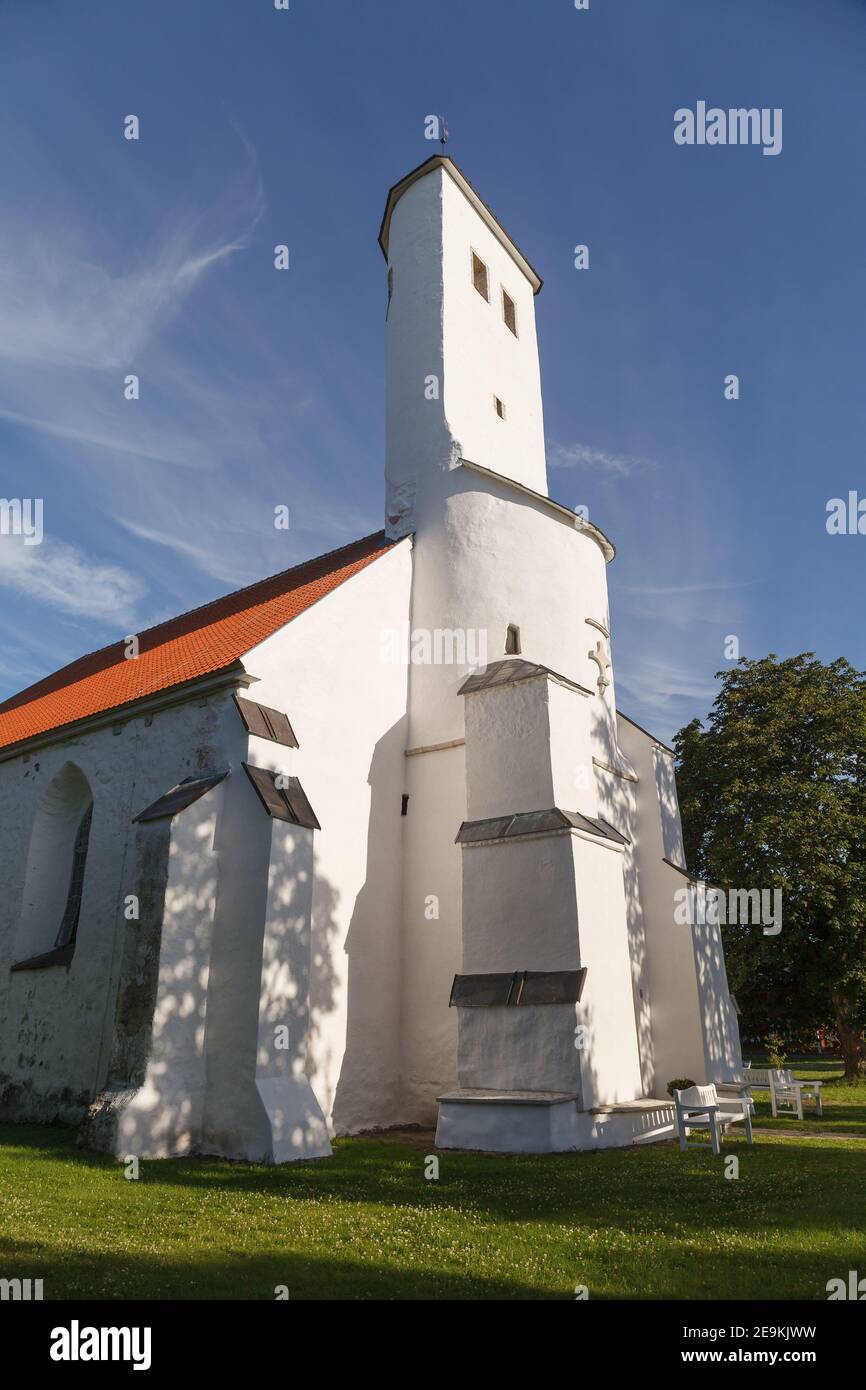 White tower and building of the Harju-Risti Lutheran Church in Estonia ...