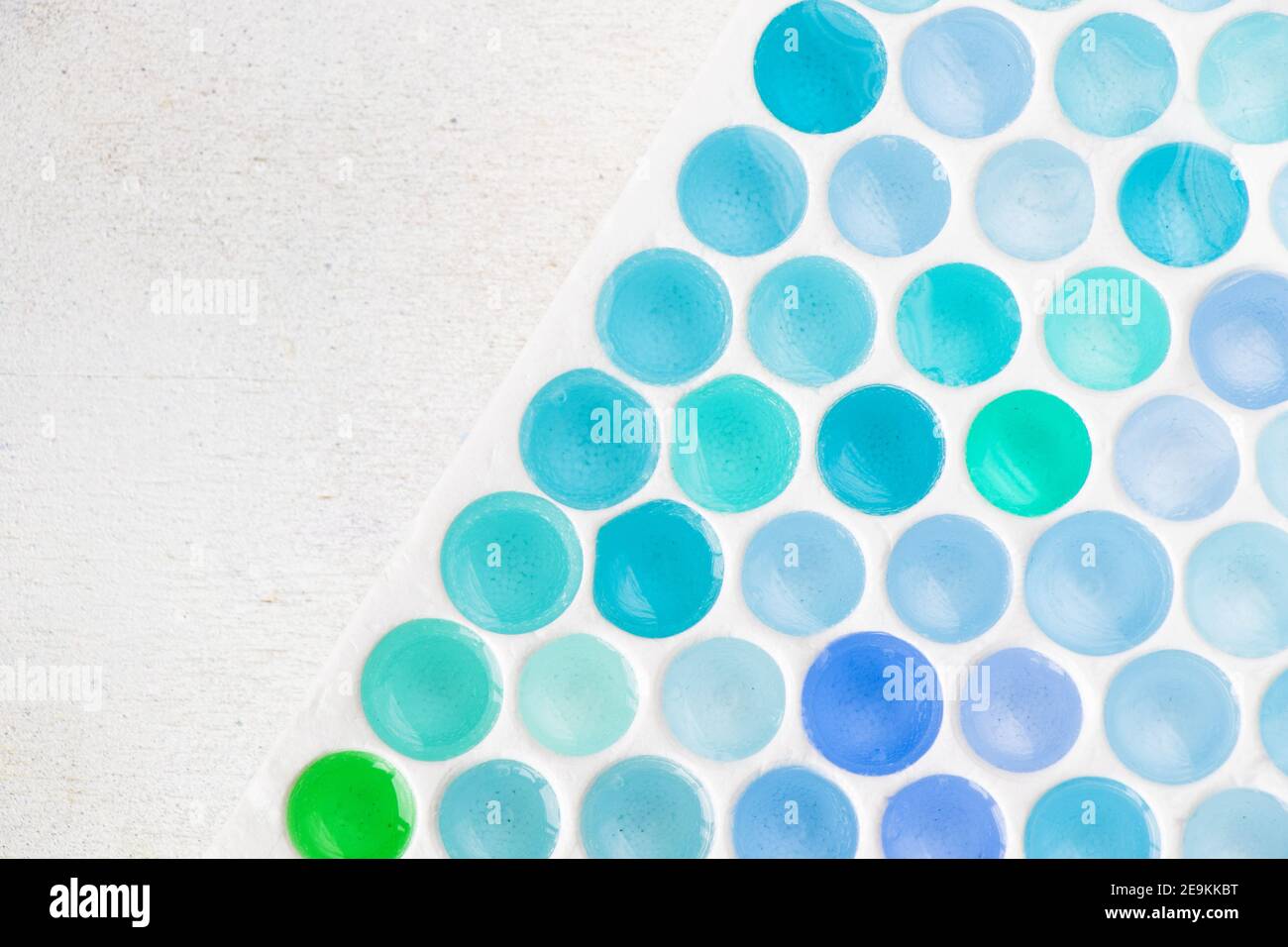 Top view of green and blue fluid color in circle gradients isolated on ...