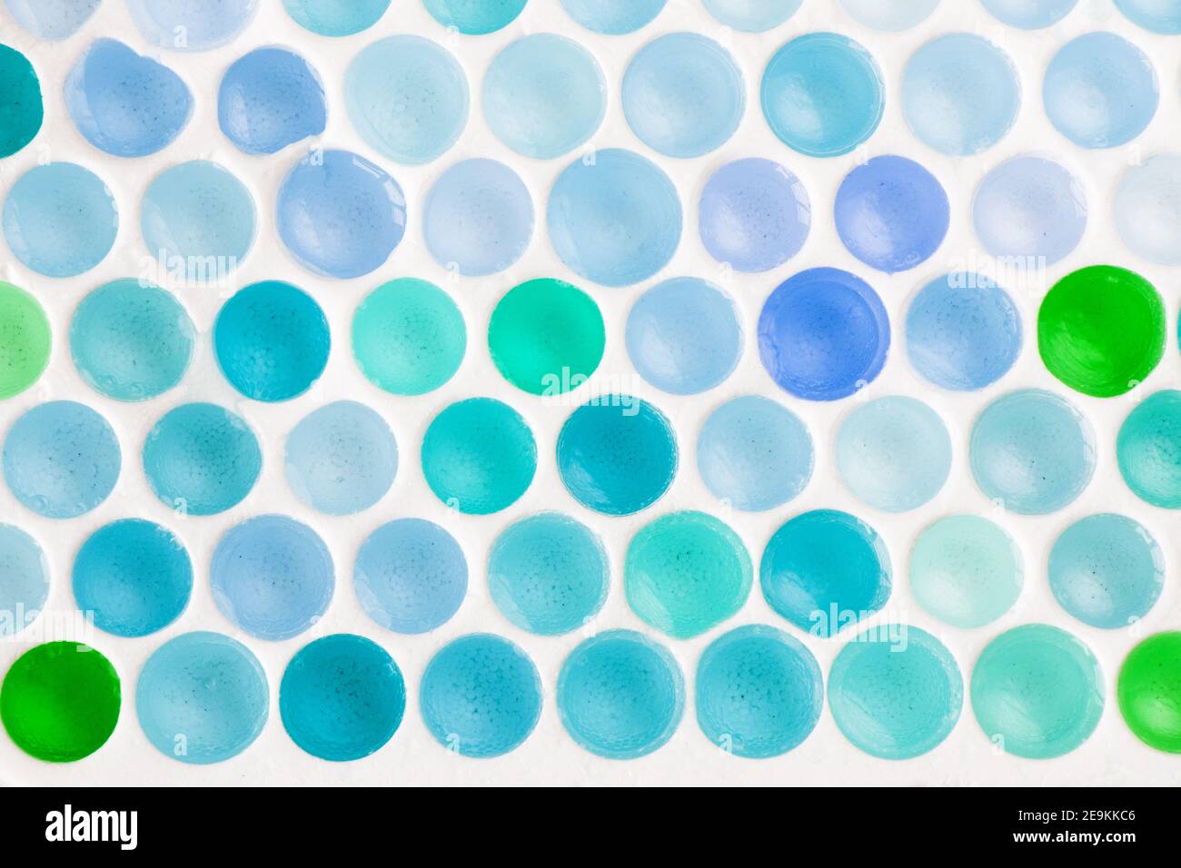 Top view of green and blue fluid color in circle gradients isolated on ...