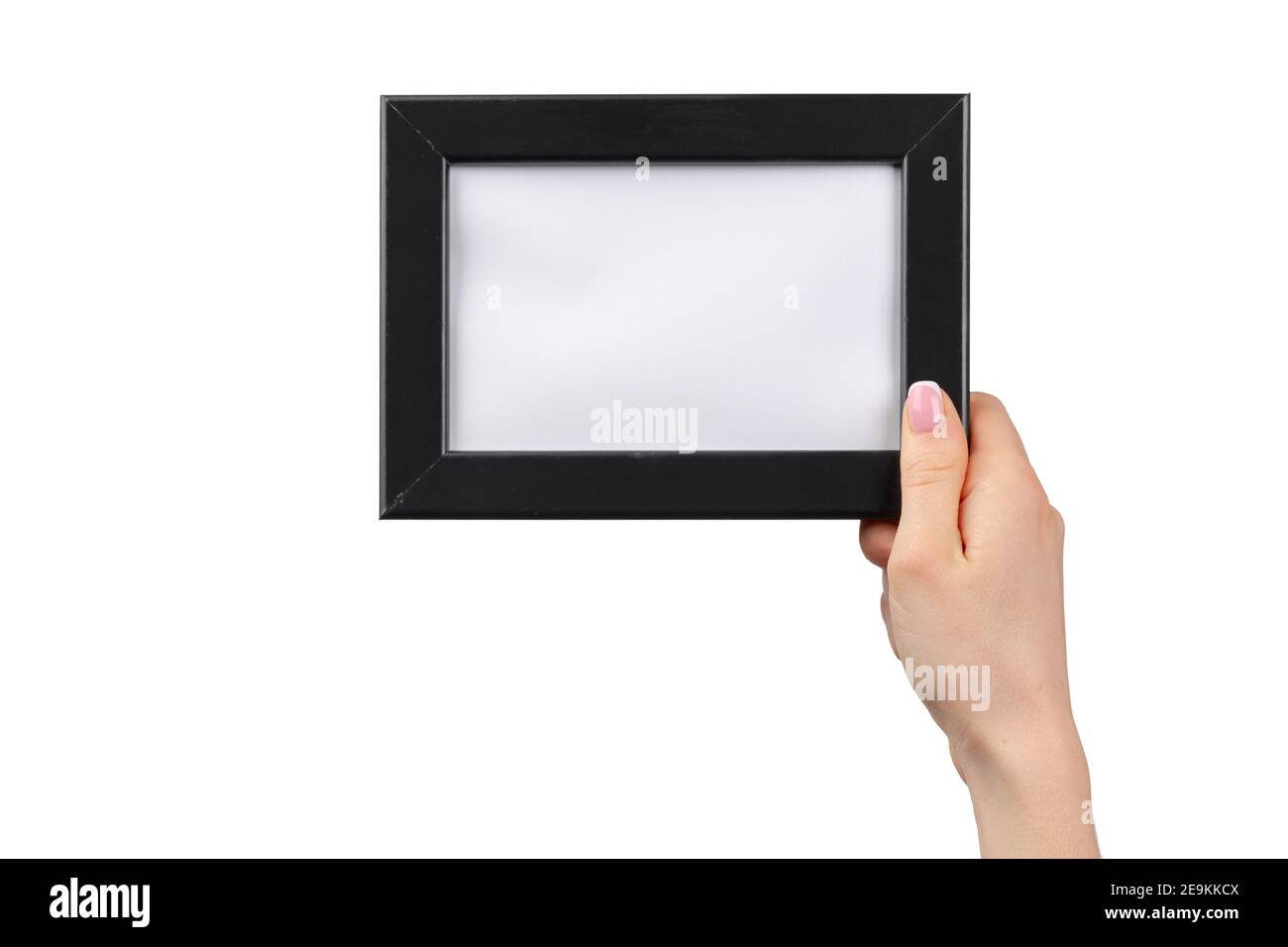 Female hands holding photo frame isolated on white Stock Photo - Alamy