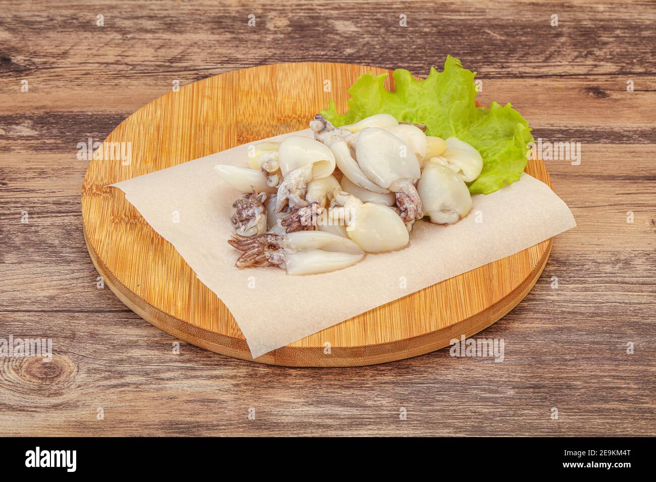 Raw seafood - cuttlefish for cooking over board Stock Photo - Alamy
