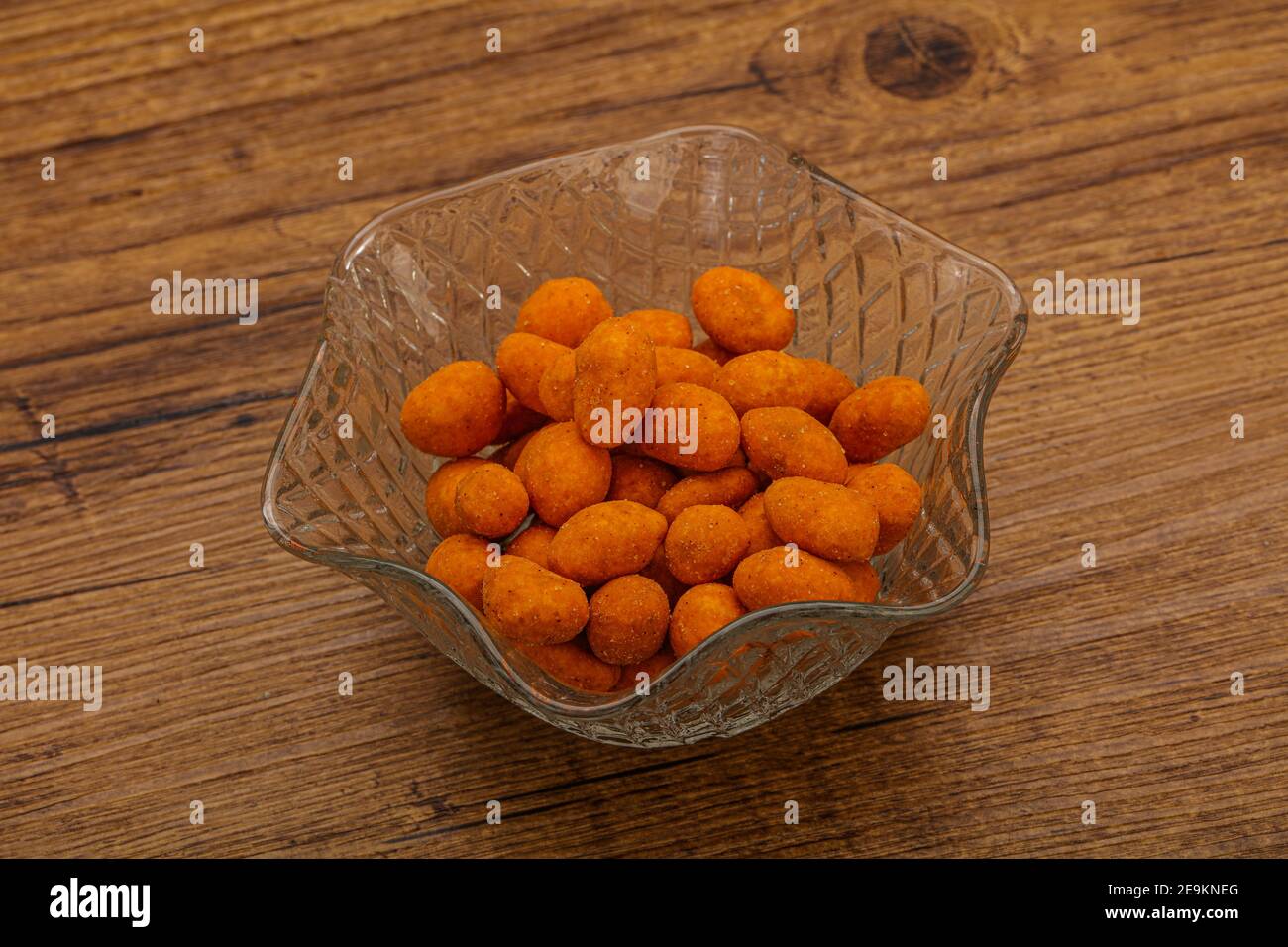 Spicy bbq peanut heap in the bowl Stock Photo - Alamy