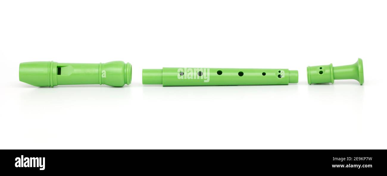 Green block flute isolated on white background Stock Photo - Alamy