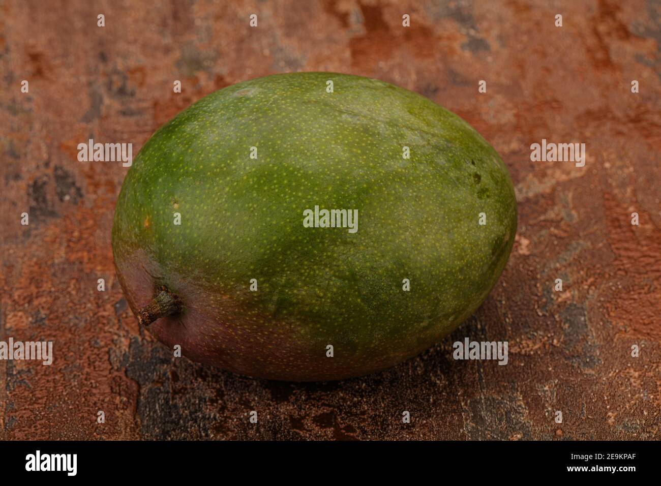 Tropical fruit - Green sweet tasty mango Stock Photo - Alamy