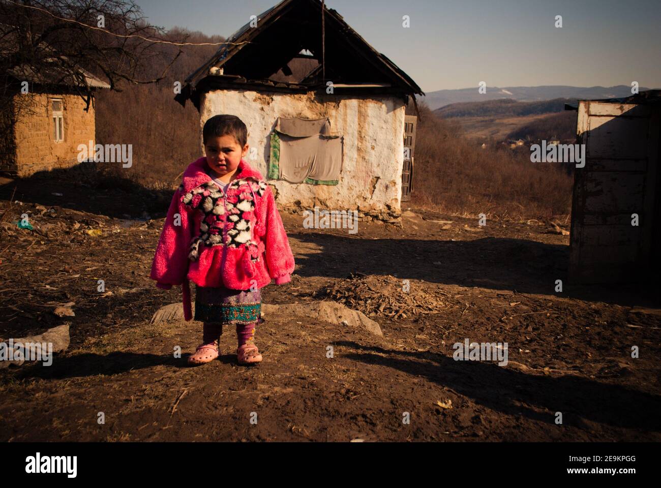 SEREDNIE, UKRAINE - MARCH 09, 2011: Girl living in terrible misery and ...