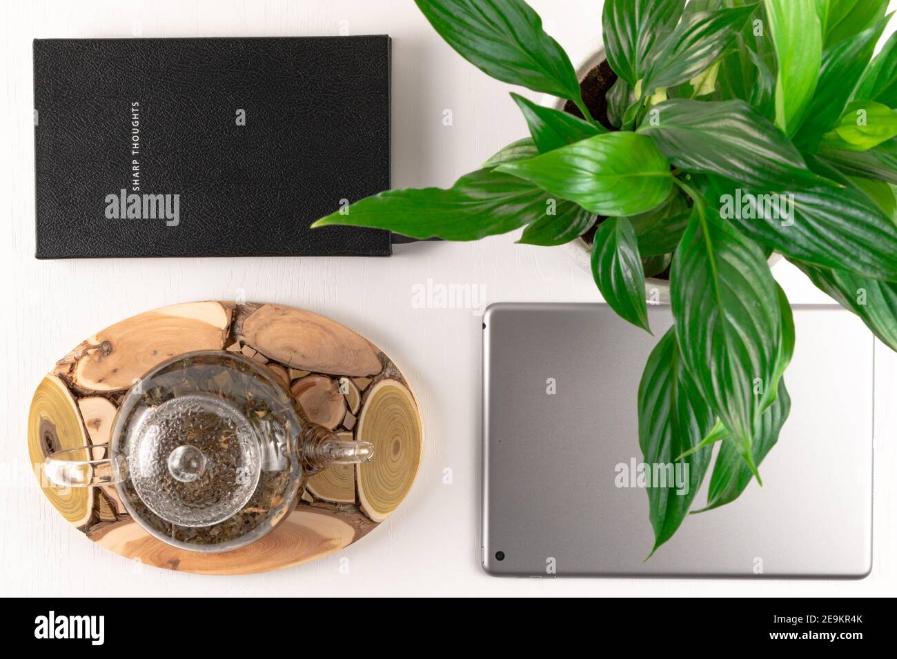 Office table notepad computer tea hi-res stock photography and images ...