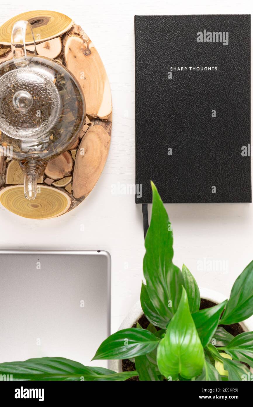 Office table notepad computer tea hi-res stock photography and images ...