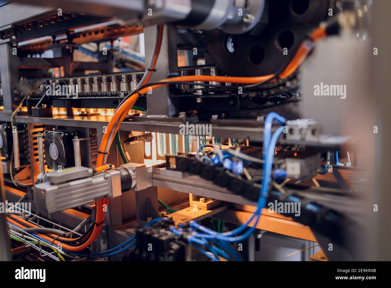 Plastic industry: Small brown plastic banks for bottles at ...