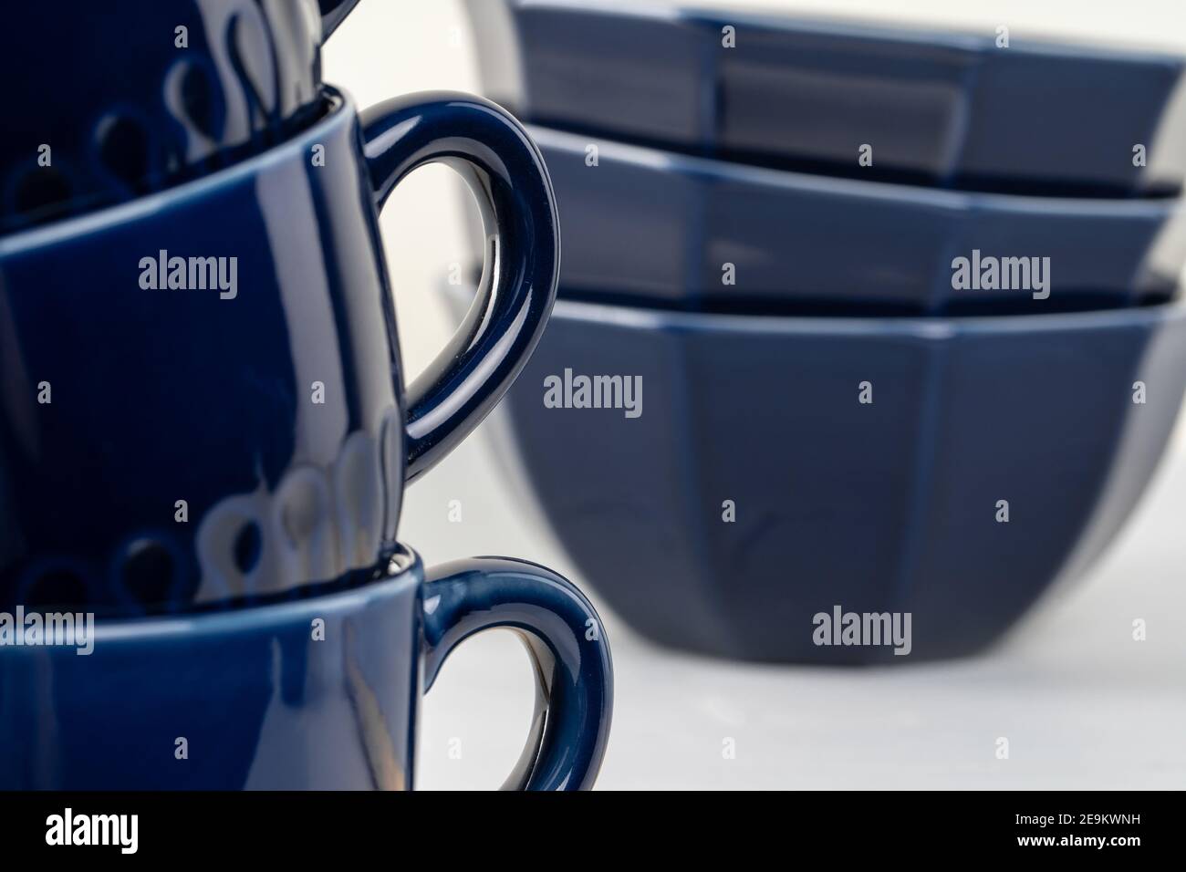 Simple ceramic blue crockery on kitchen counter Stock Photo - Alamy