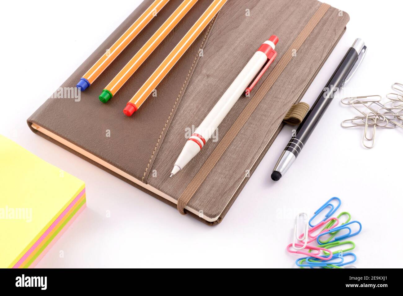 Office supplies isolated on white Stock Photo - Alamy