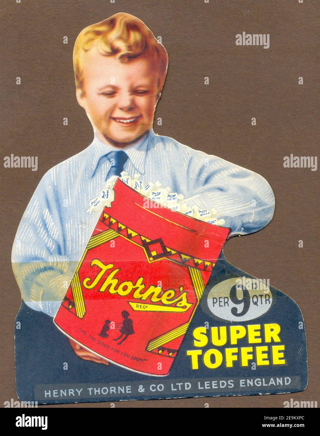 Colourful standee advertisement of young boy helping himself to a ...