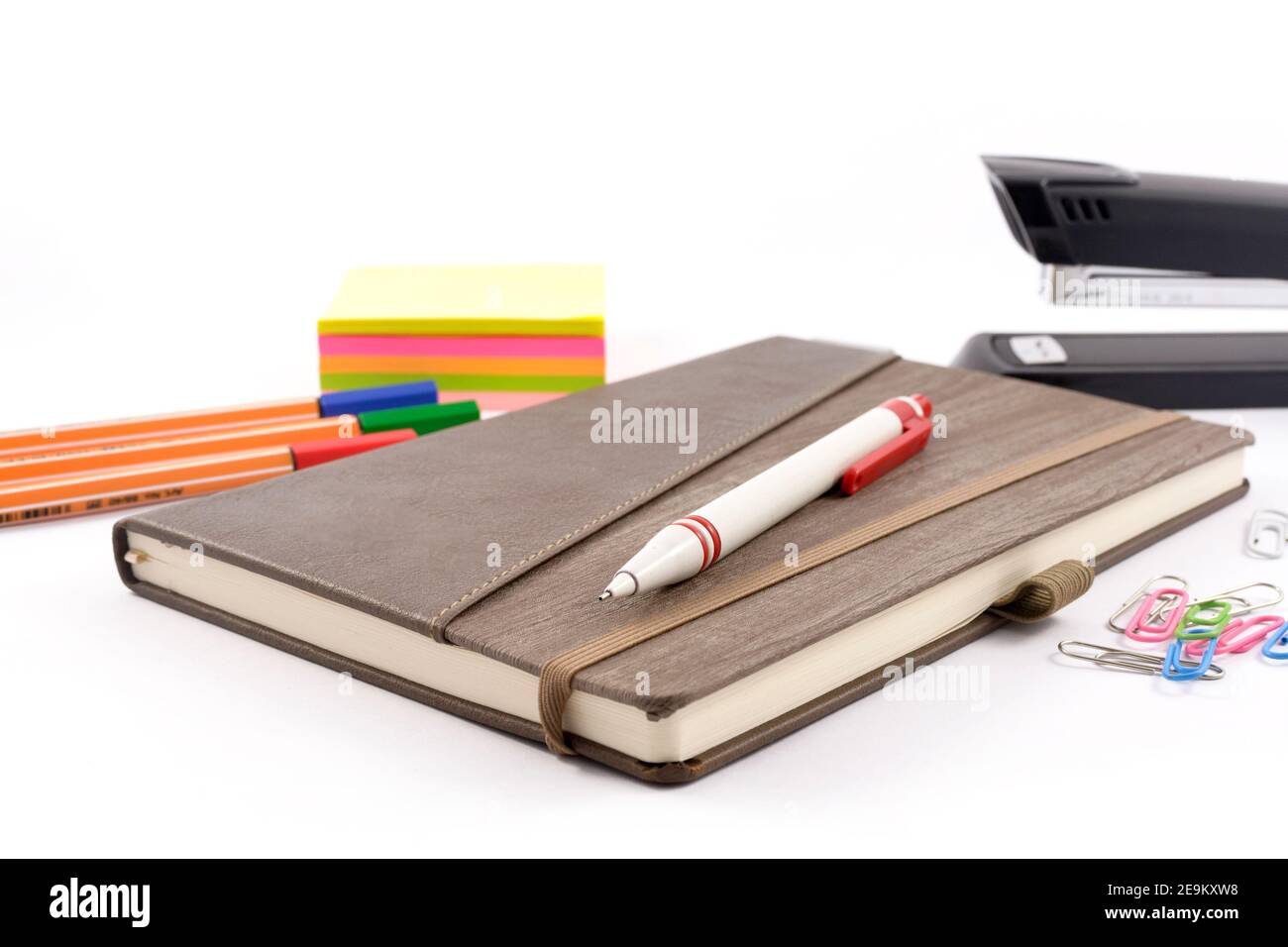 Office supplies isolated on white Stock Photo - Alamy
