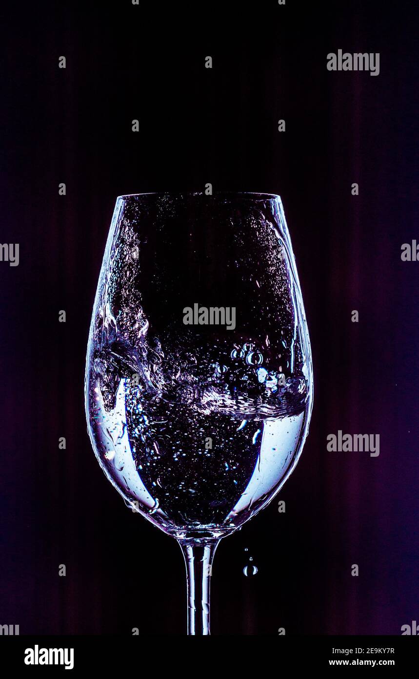 Clear water in a glass, delicious spring transparent with a splash in the glass Stock Photo - Alamy